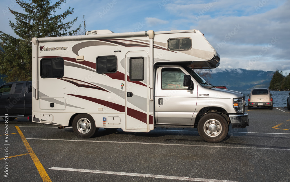 Travel trailer camper van parked. Modern campervan recreational motor ...