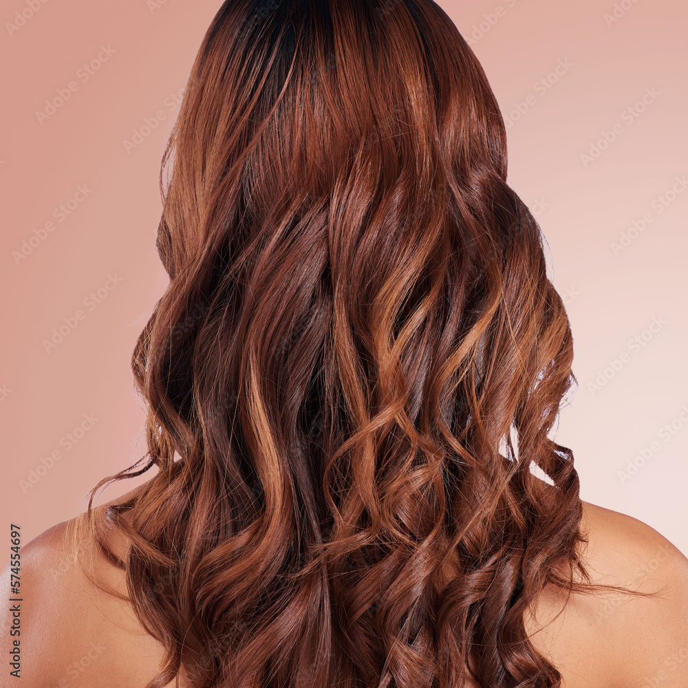Beauty, back and hair care of woman in studio isolated on a red ...