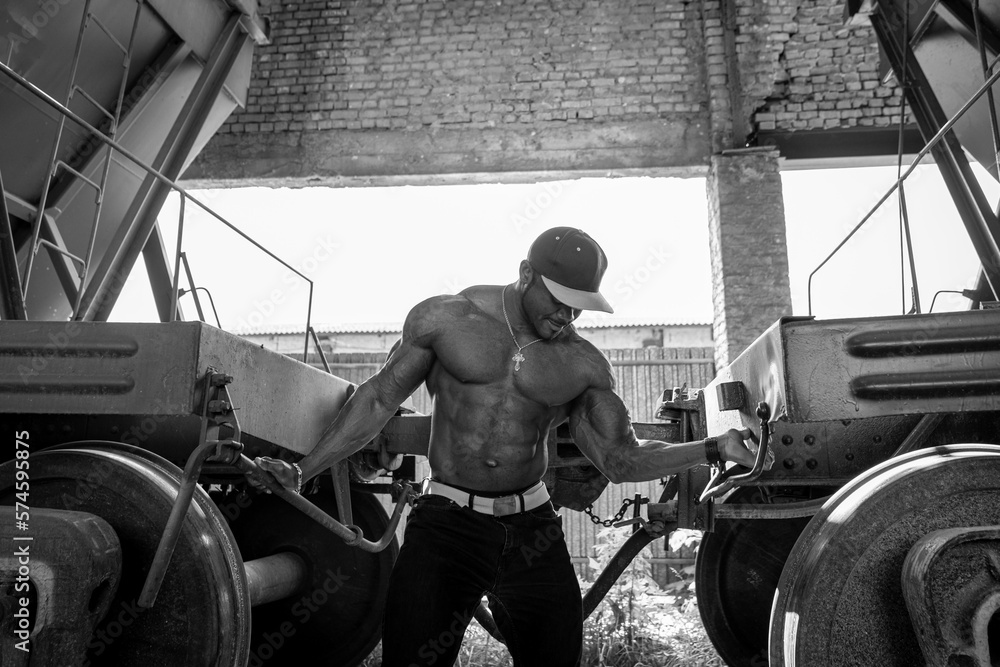 Confident handsome sporty guy. Athletic strongman with shirtless ...