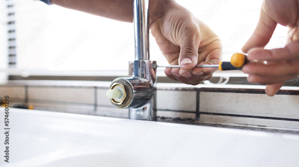 Plumber man, tap and hands with screw tools of building maintenance ...