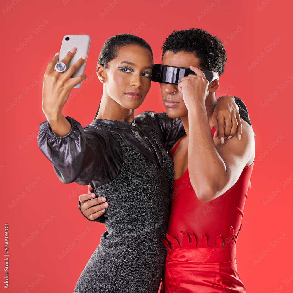Selfie, fashion and funky people isolated on red background for queer ...