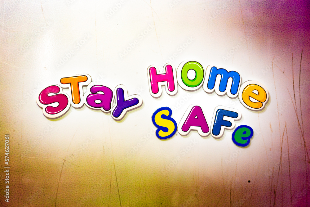 Colorful lettering 'Stay Home Stay Safe' with fridge magnets. Stay Home ...