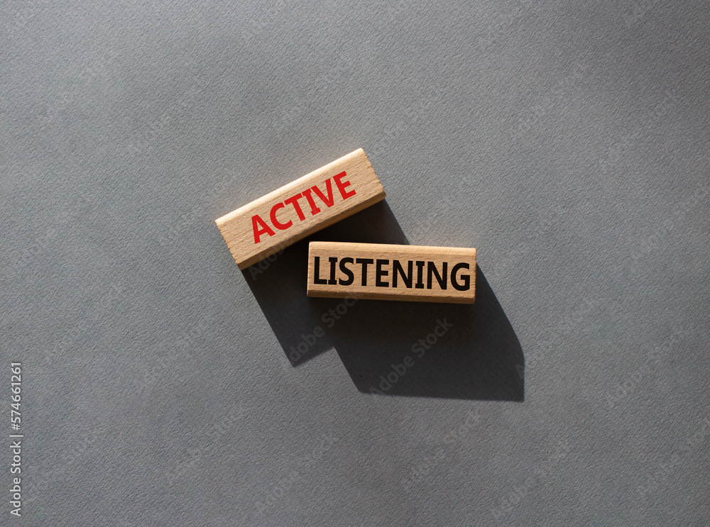 Active listening symbol. Wooden blocks with words Active listening ...