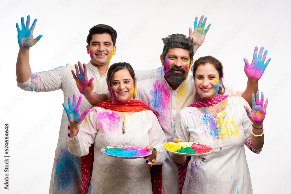 Young indian people showing colors hand and celebrating holi festival ...