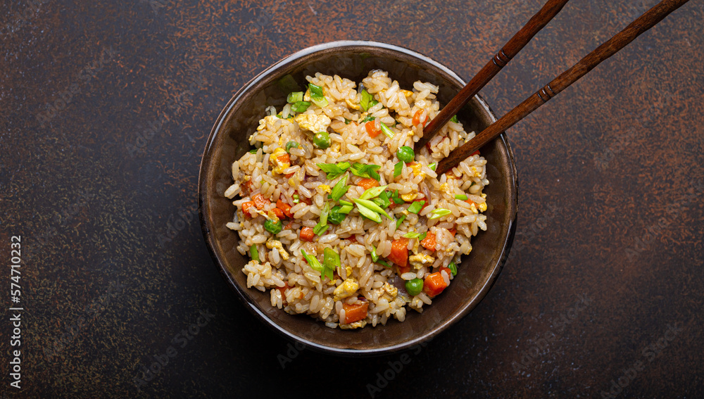 Authentic Chinese and Asian fried rice with egg and vegetables in ...