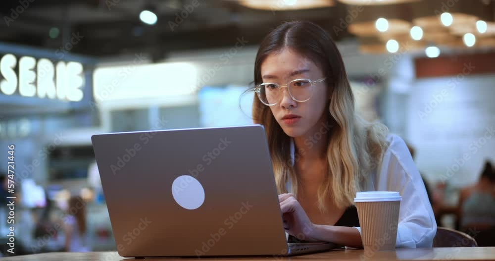 Cute asian female student girl use computer for studying online while ...