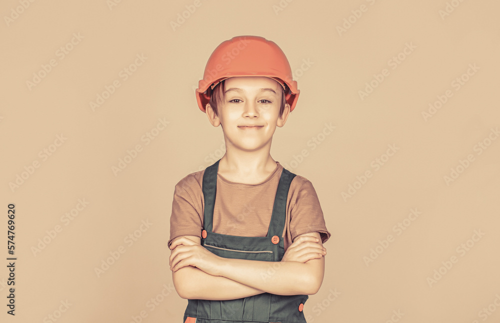 hild building helmet, hard hat. Little boy wearing helmet. Little ...