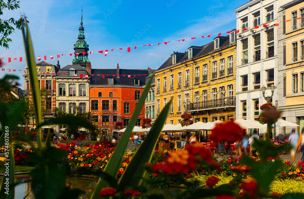 Picturesque summer view of flowering central Grand Place square in Mons ...