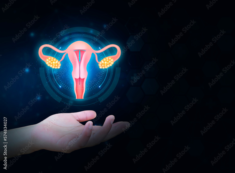 Hand holding a T-shaped birth control intrauterine device, IUD inside ...
