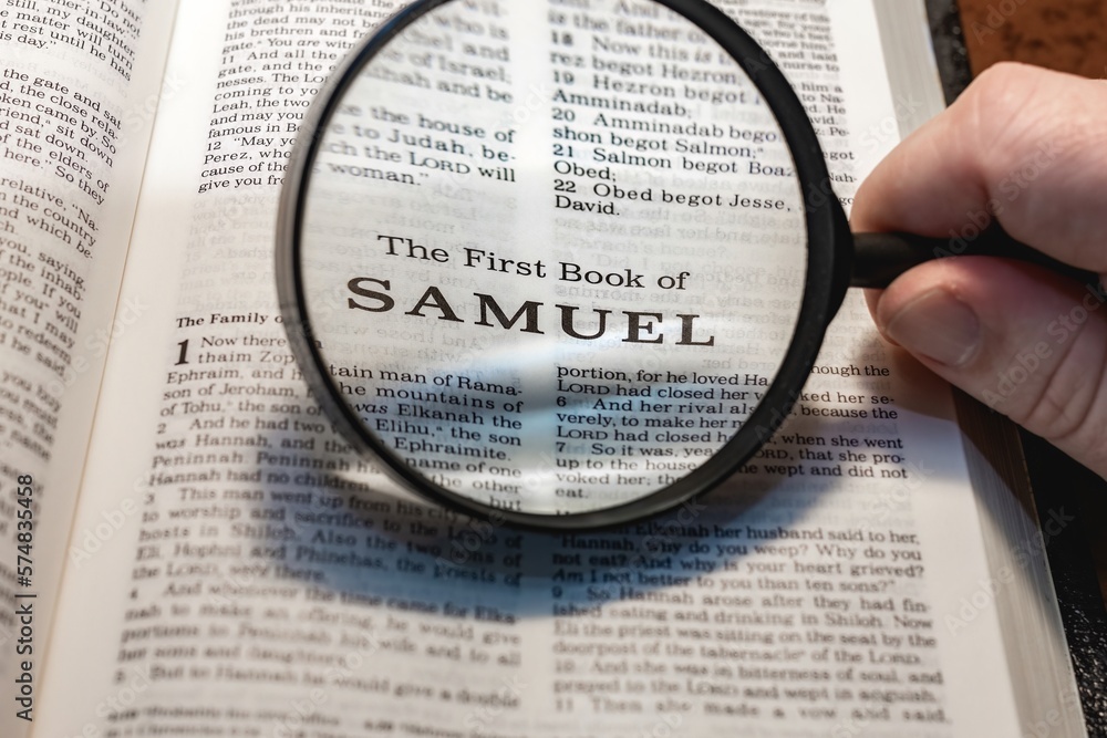 title page book of first Samuel close up using magnifying glass in the ...