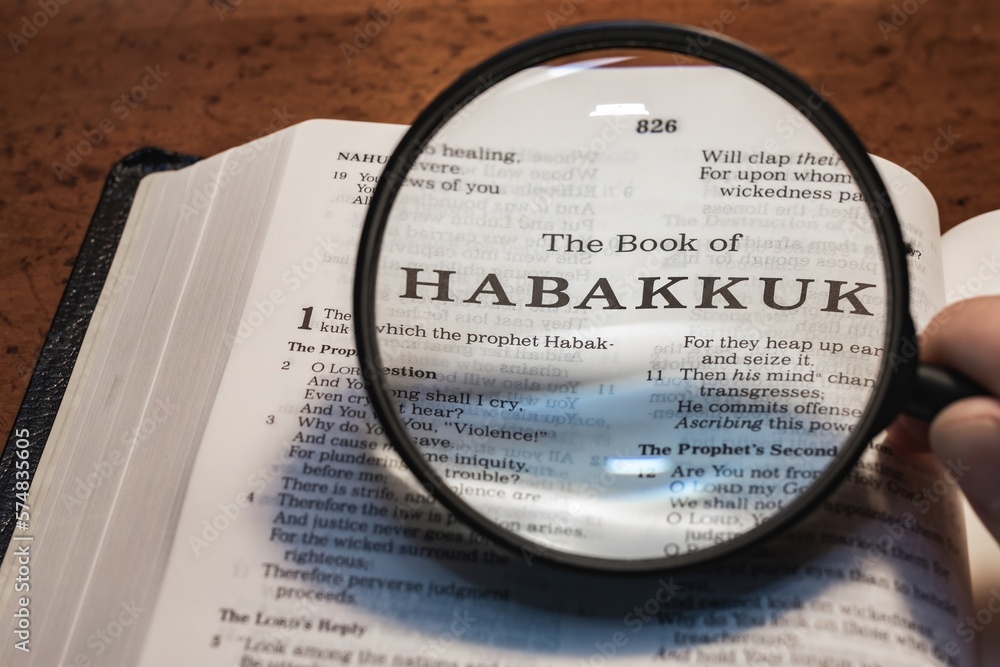 title page book of Habakkuk close up using magnifying glass in the ...