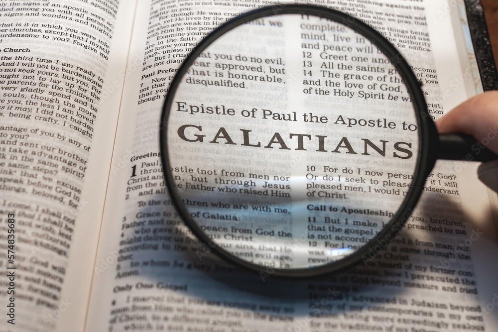 title page book of Galatians close up using magnifying glass in the ...