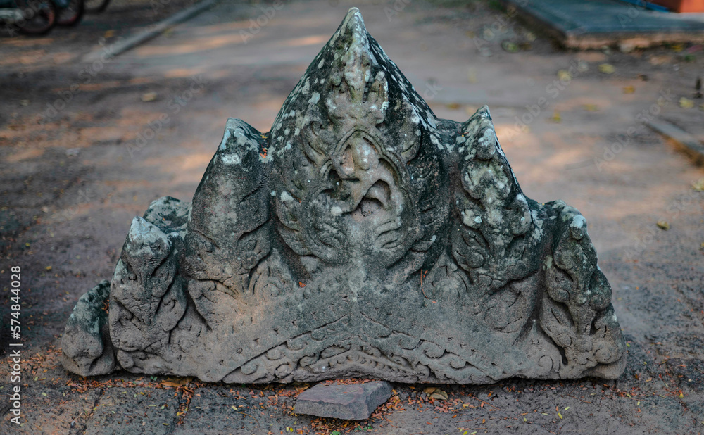 Sandstone carvings on the ground awaiting restoration of Prasat Phanom ...