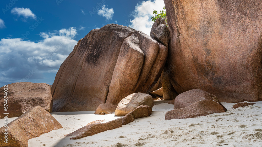 Huge picturesque granite boulders and rocks on the beach of a tropical ...