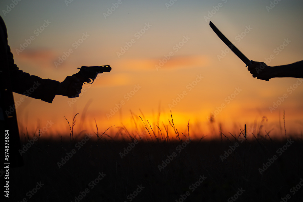 Katana versus revolver fight in the field. Military conflict in Asia ...