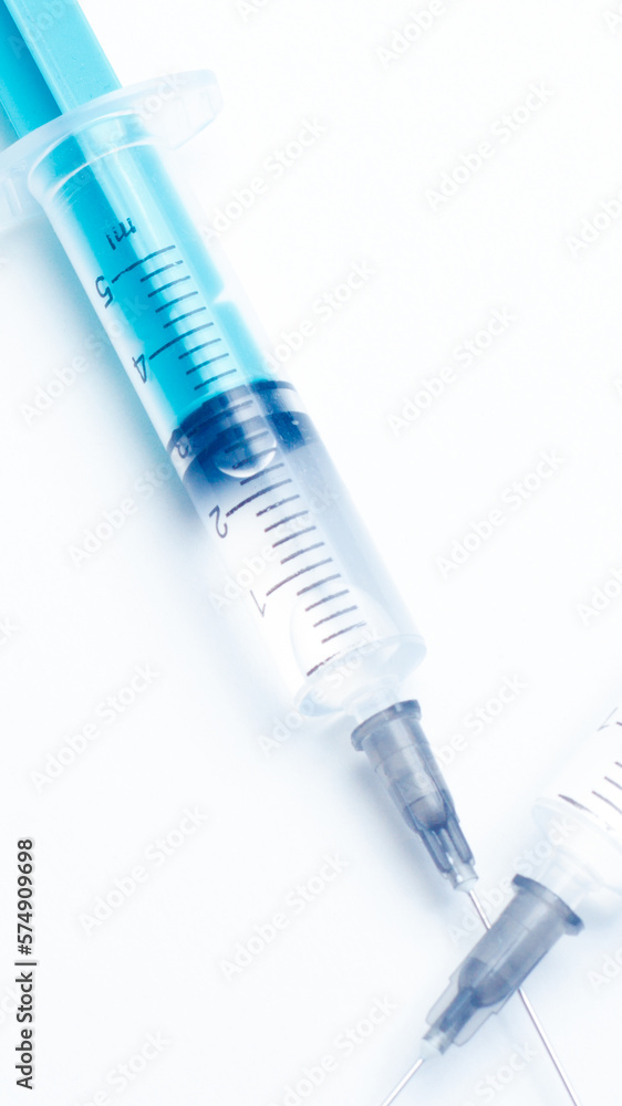 Disposable plastic syringe prepared for injection and vaccination in ...