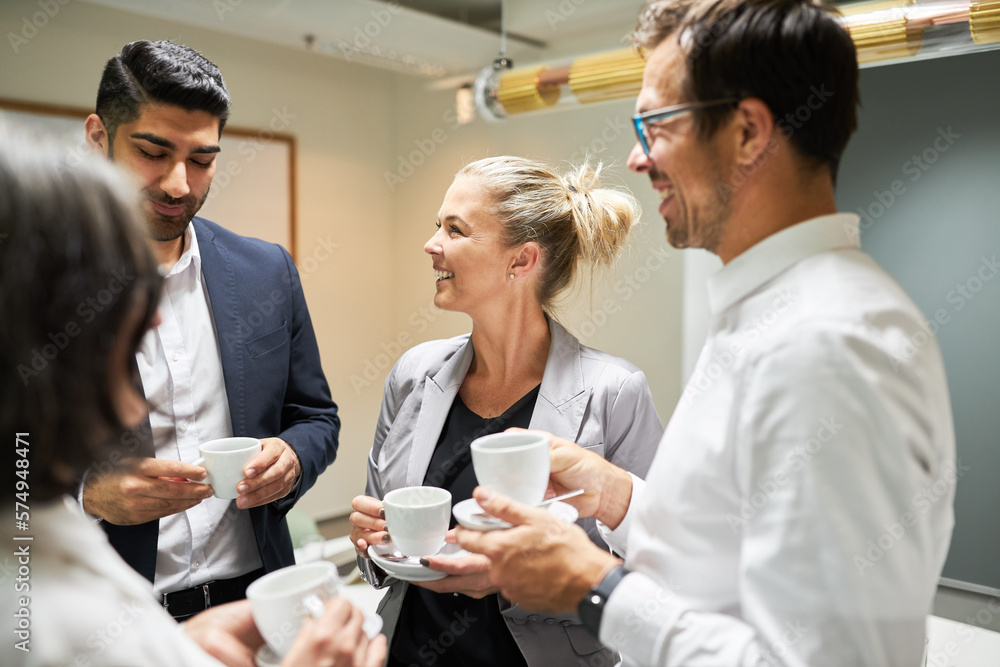 Relaxed small talk over a cup of coffee during a break Stock Photo ...