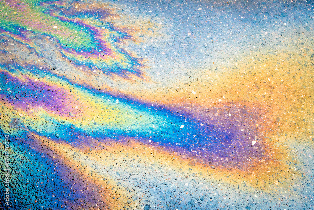 Oil spill on wet asphalt, parking lot with dividing line. Stock Photo ...