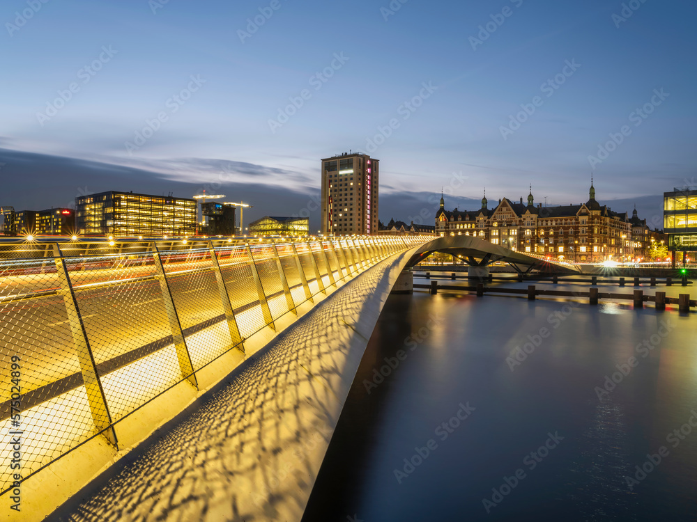 Lille Langebro cycle and pedestrian bridge over the city harbour lit up ...