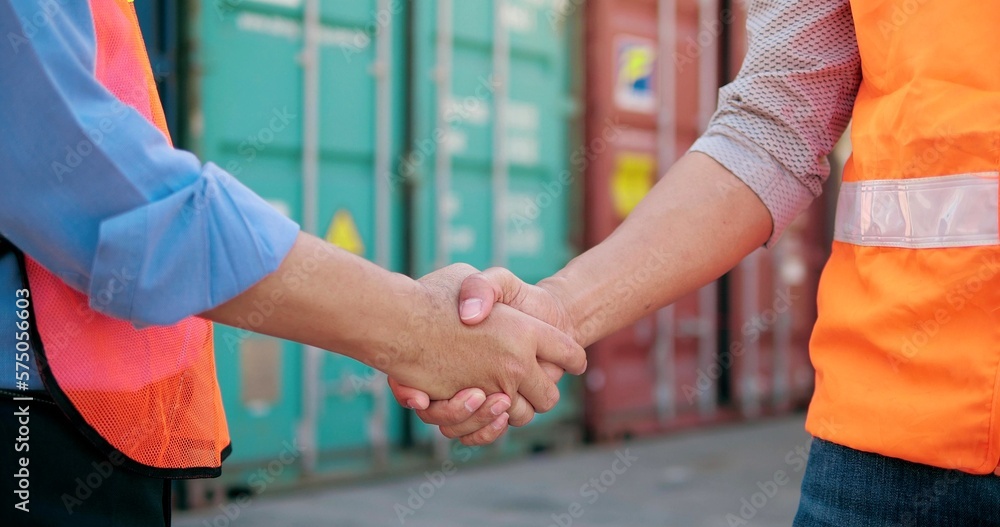 Handshake in construction site industrial worker on factory warehouse ...
