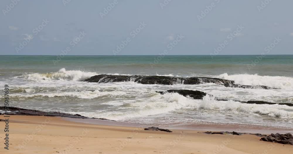 Cape Coast Ghana African ocean surf beach. Ocean waves crash rocky ...