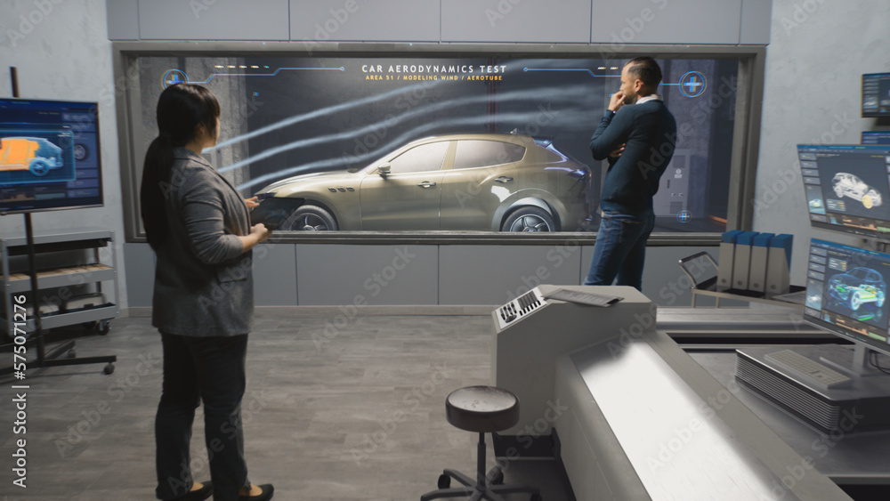 Engineers check aerodynamics of eco-friendly electric car in lab for ...