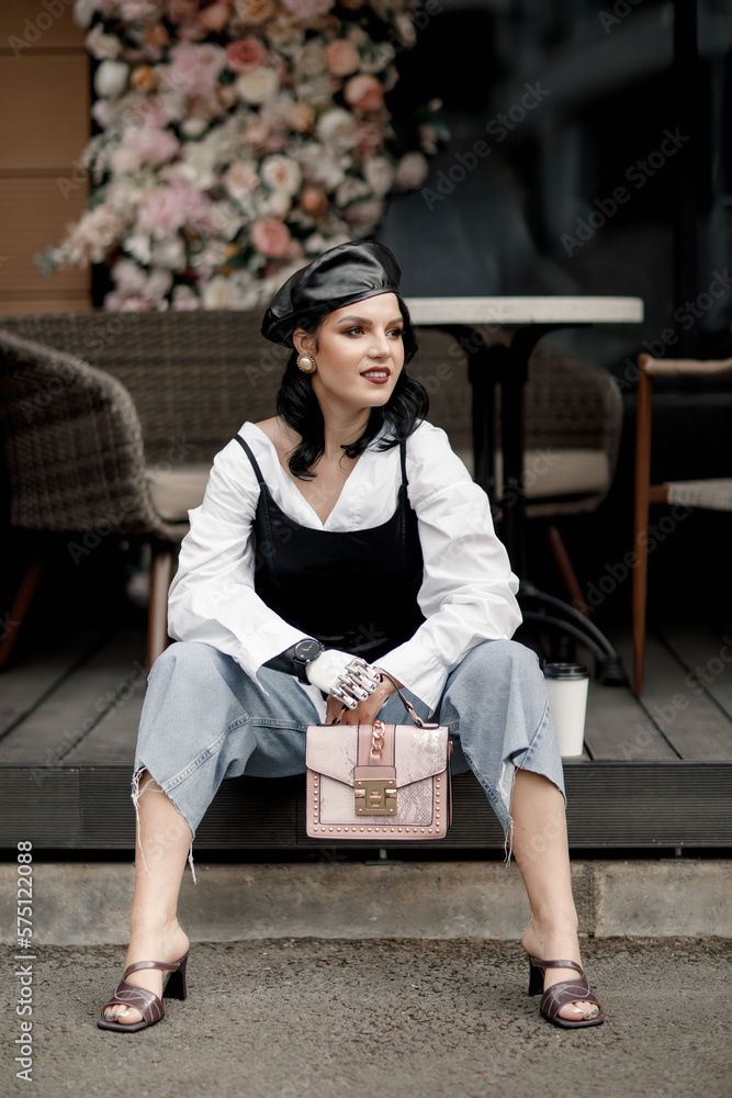 Beauty disabled french styled Woman with bionic prosthetic arm ...