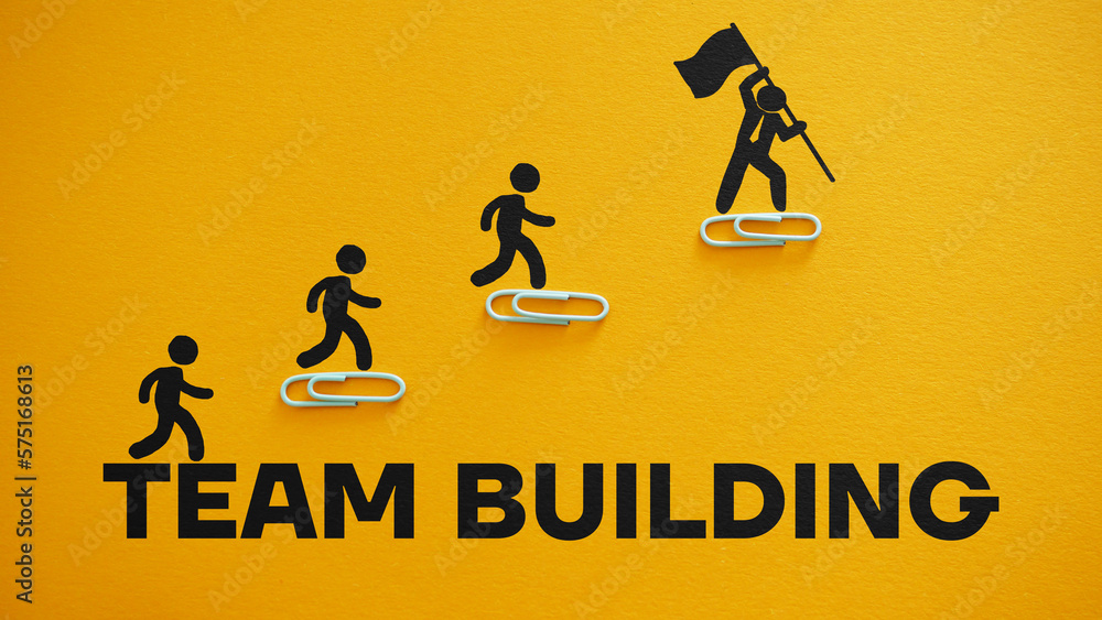 Team building is shown using the text Stock Photo | Adobe Stock