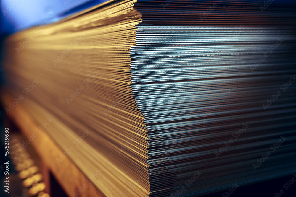 Sheets of metal in a stack in a warehouse Stock Photo | Adobe Stock
