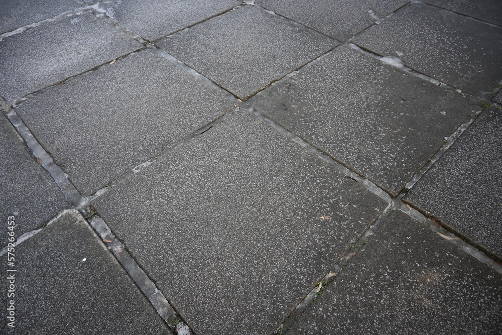 asphalt soviet square concrete tile, asphalt tile covered with thin ice ...