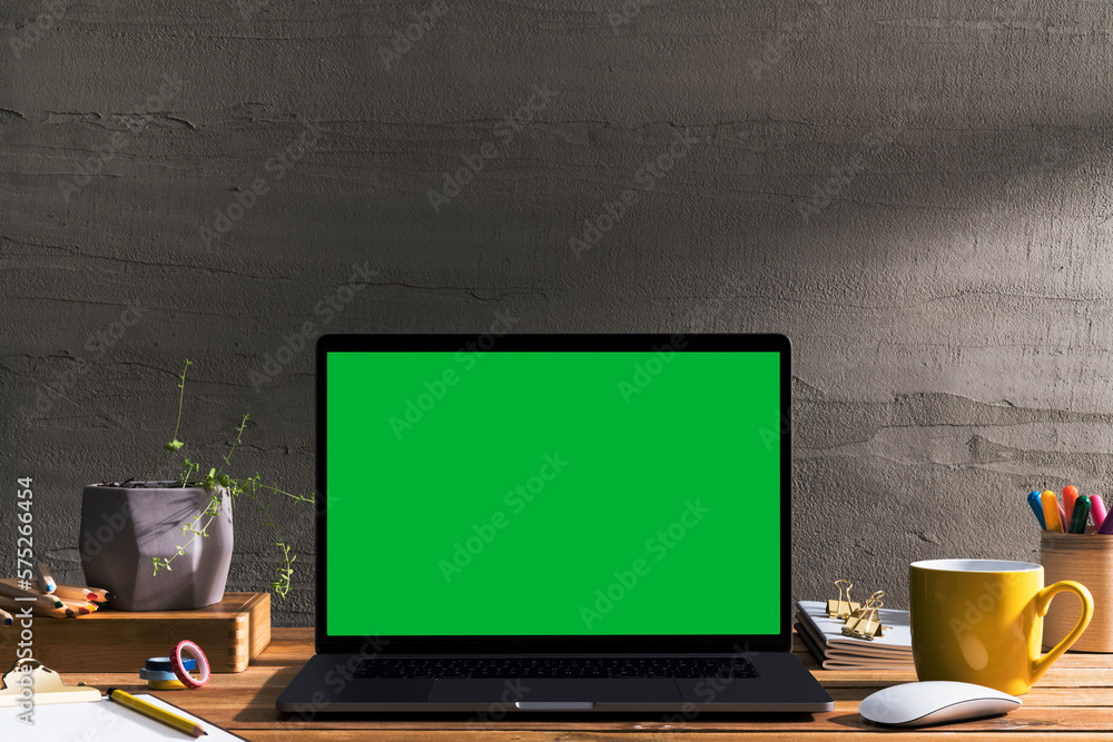 Chroma key green screen laptop on table with creative tools Stock Photo ...