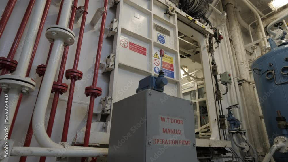 Manual operation pump of watertight sliding door with in engine room of ...