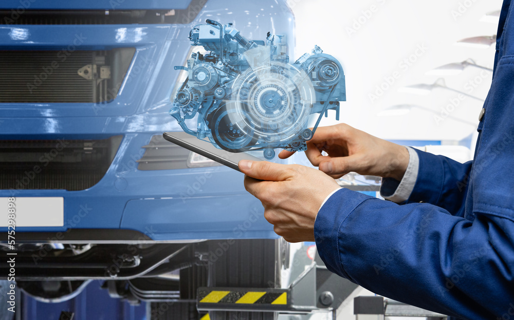 Serviceman repairing a truck using augmented reality application. Stock ... Serviceman repairing a truck using augmented reality application. Stock ...