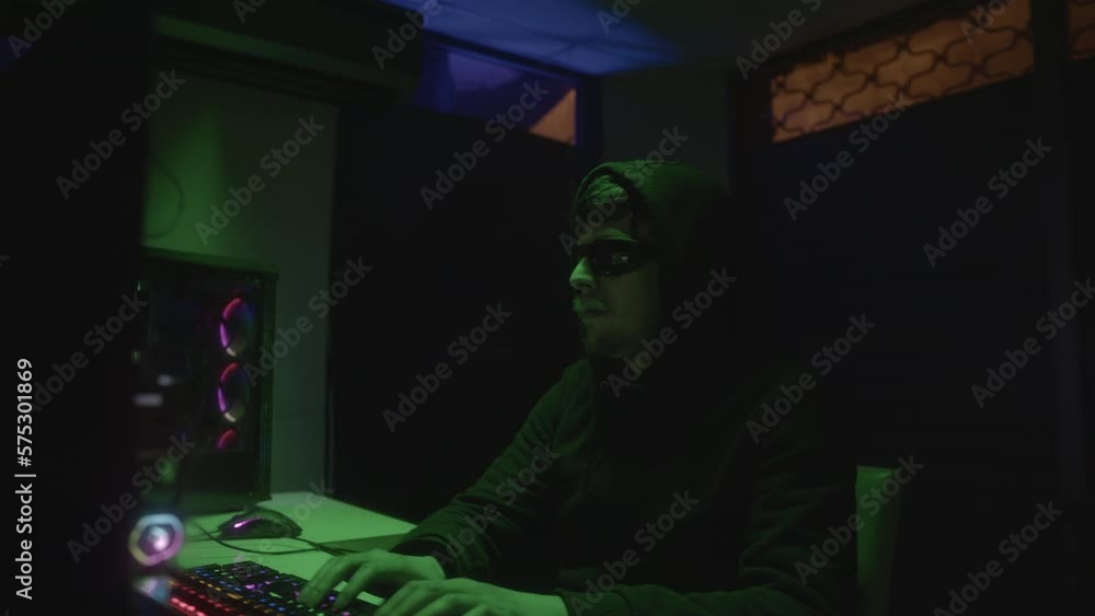 Black Glasses-Wearing Evil Hacker Hacking Someone on Computer, Looking ...