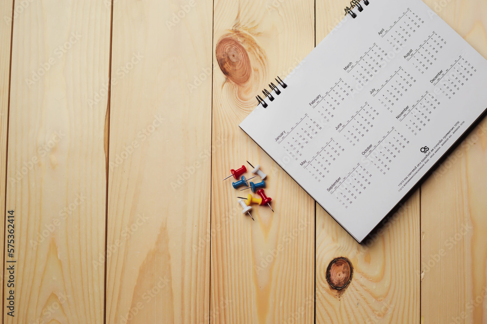 Embroidered red pins on a calendar event Planner calendar,clock to set ...