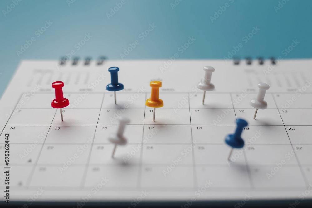 Embroidered red pins on a calendar event Planner calendar,clock to set ...