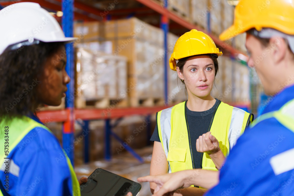 Group of professional multi national warehouse workers or staffs having ...