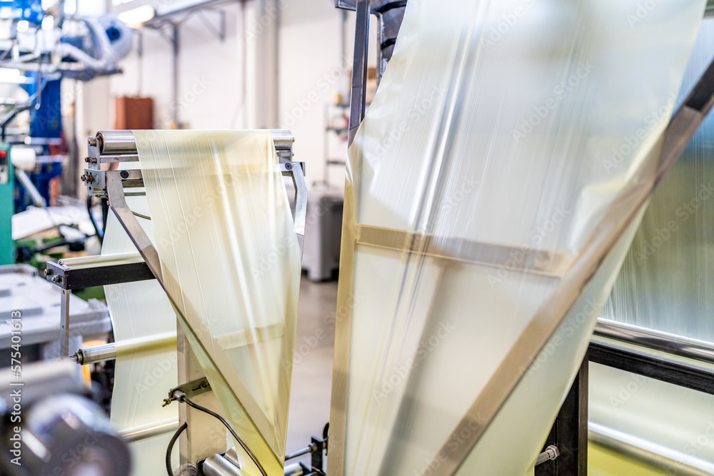 production of plastic packaging materials in the factory Stock Photo ...