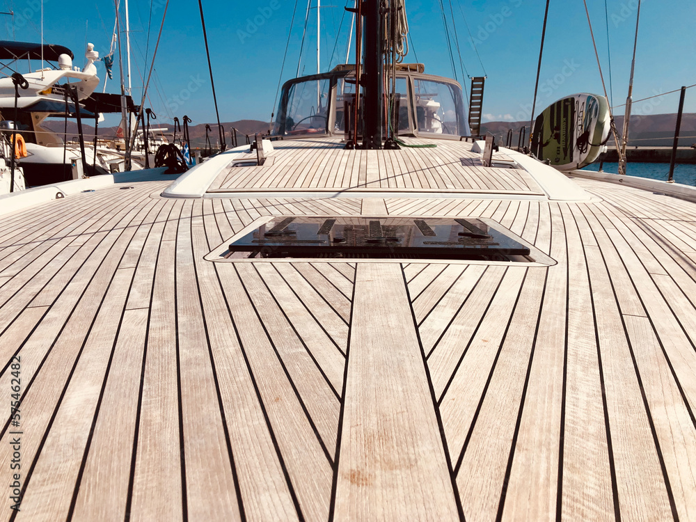 Bow-to-stern view of a First 53 performance sailboat with teak deck and ...