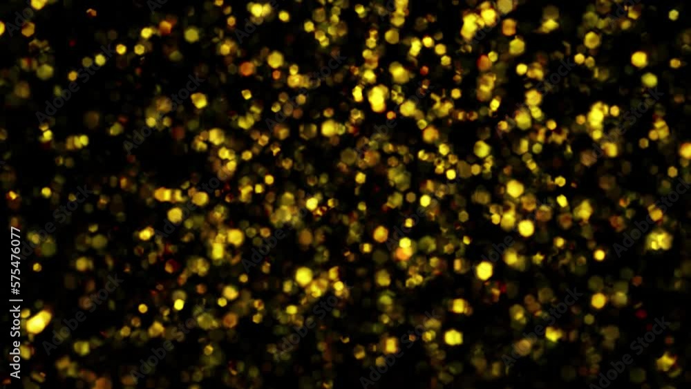 Particle gold dust flickering on black background. Gold Particles ...