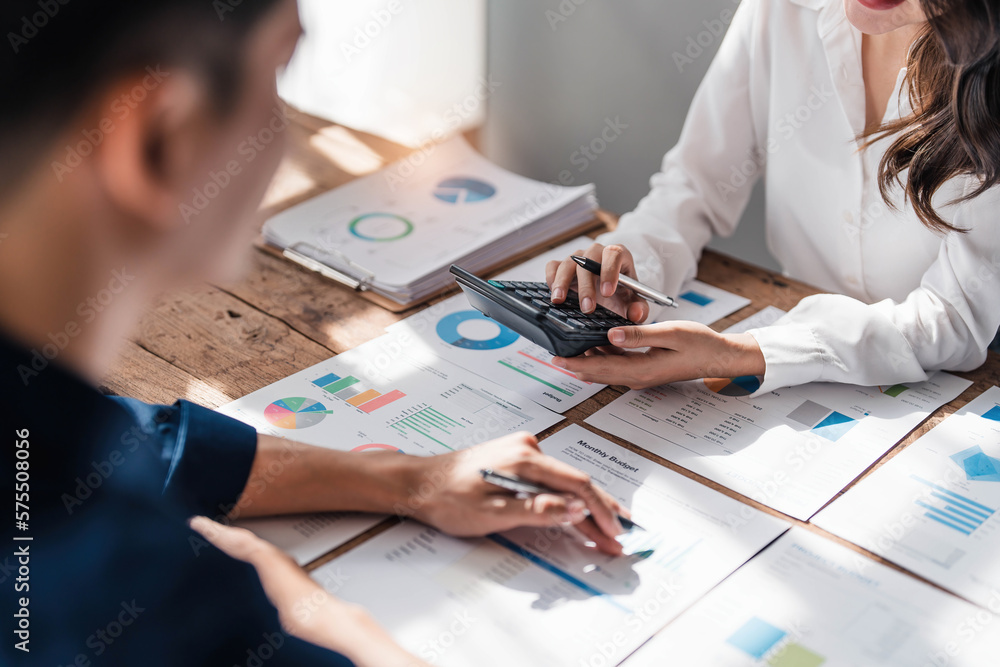 Two business people talk project strategy at office meeting room ...