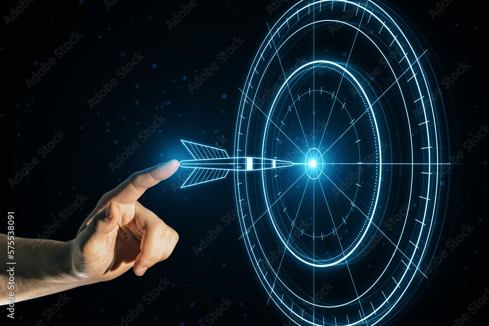 Target concept with a glowing hologram of bullseye and arrow hitting ...