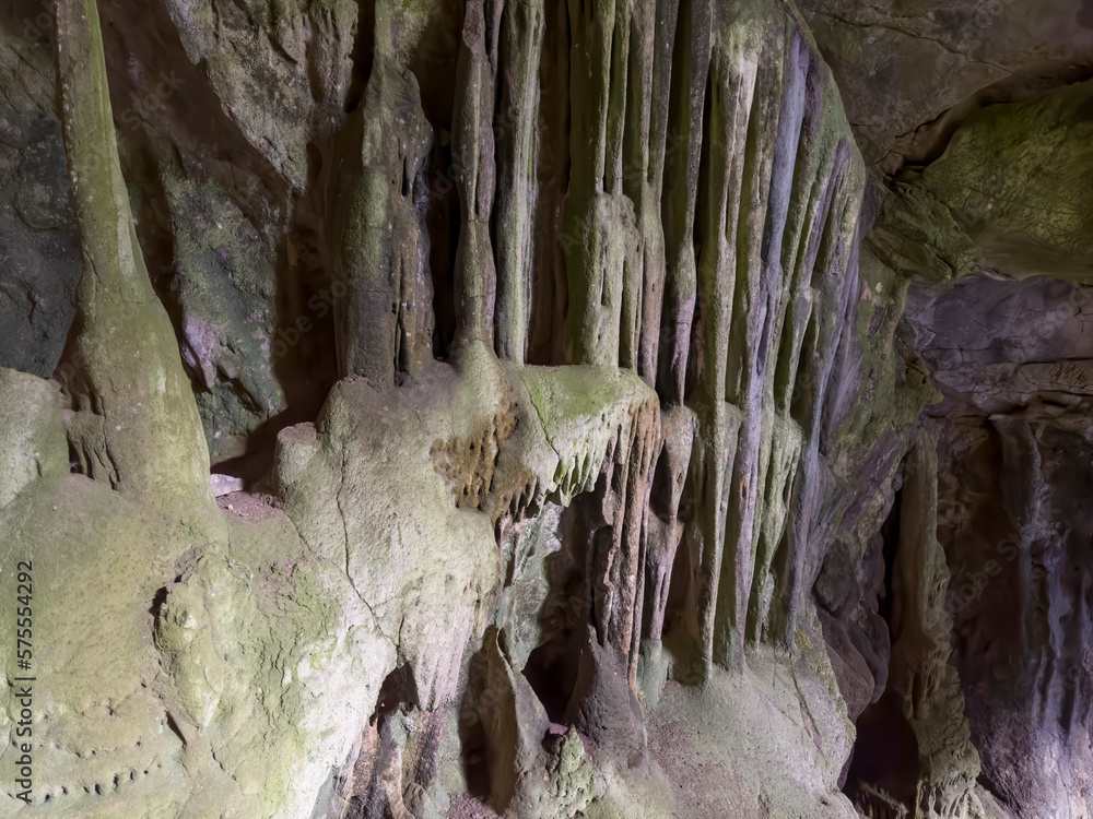 stalactites, stalagmites and large calcareous pillars inside the cave ...