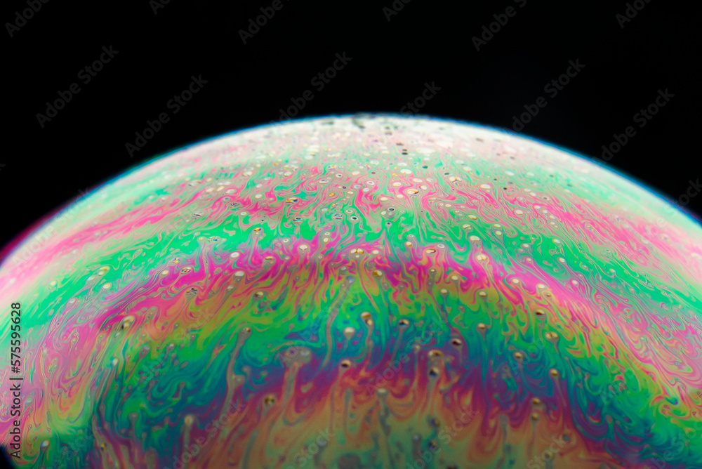 a soap bubble that shimmers in different colors.Thanks to macro ...