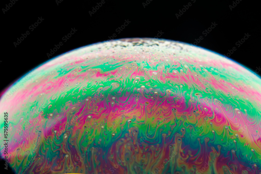 a soap bubble that shimmers in different colors.Thanks to macro ...