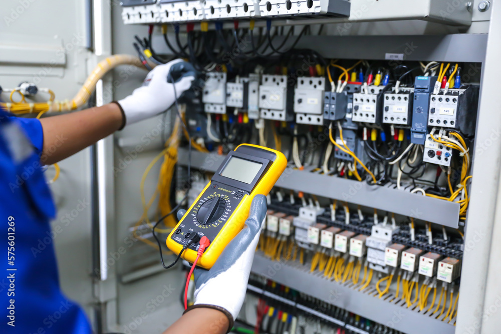Electricity or electrical maintenance service, Electrician hand holding ...