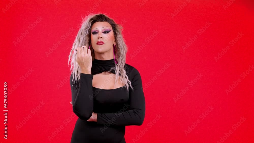 Transgender person dressed as drag queen making up Stock Video | Adobe ...