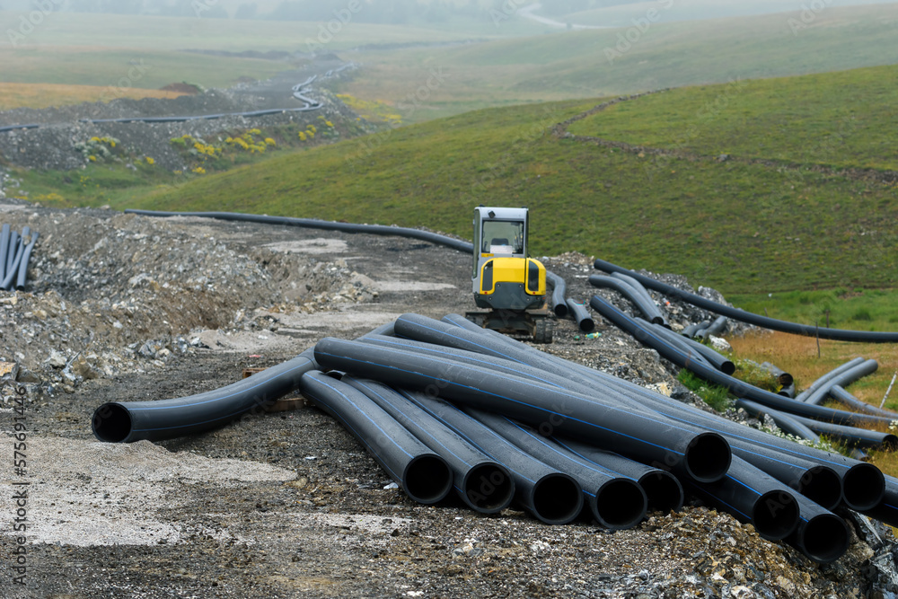 Road construction and storm water pipes for sanitary sewer Stock Photo ...
