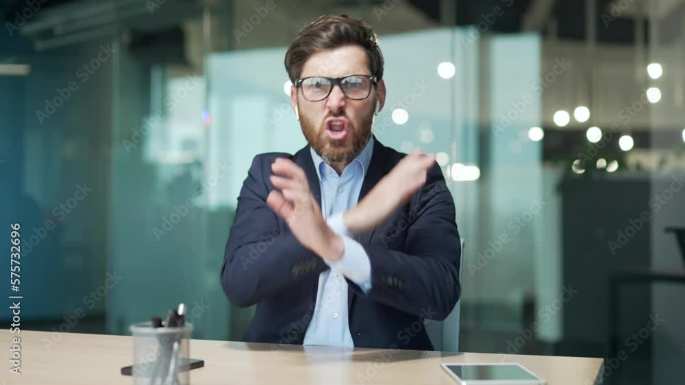 Webcam view of irritated arguing angry mature boss business man looking ...