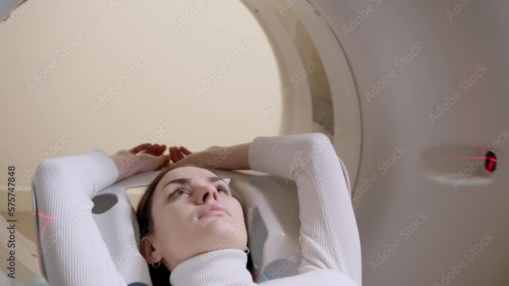 4k video girl patient is doing CT computed tomography x-ray scan of ...